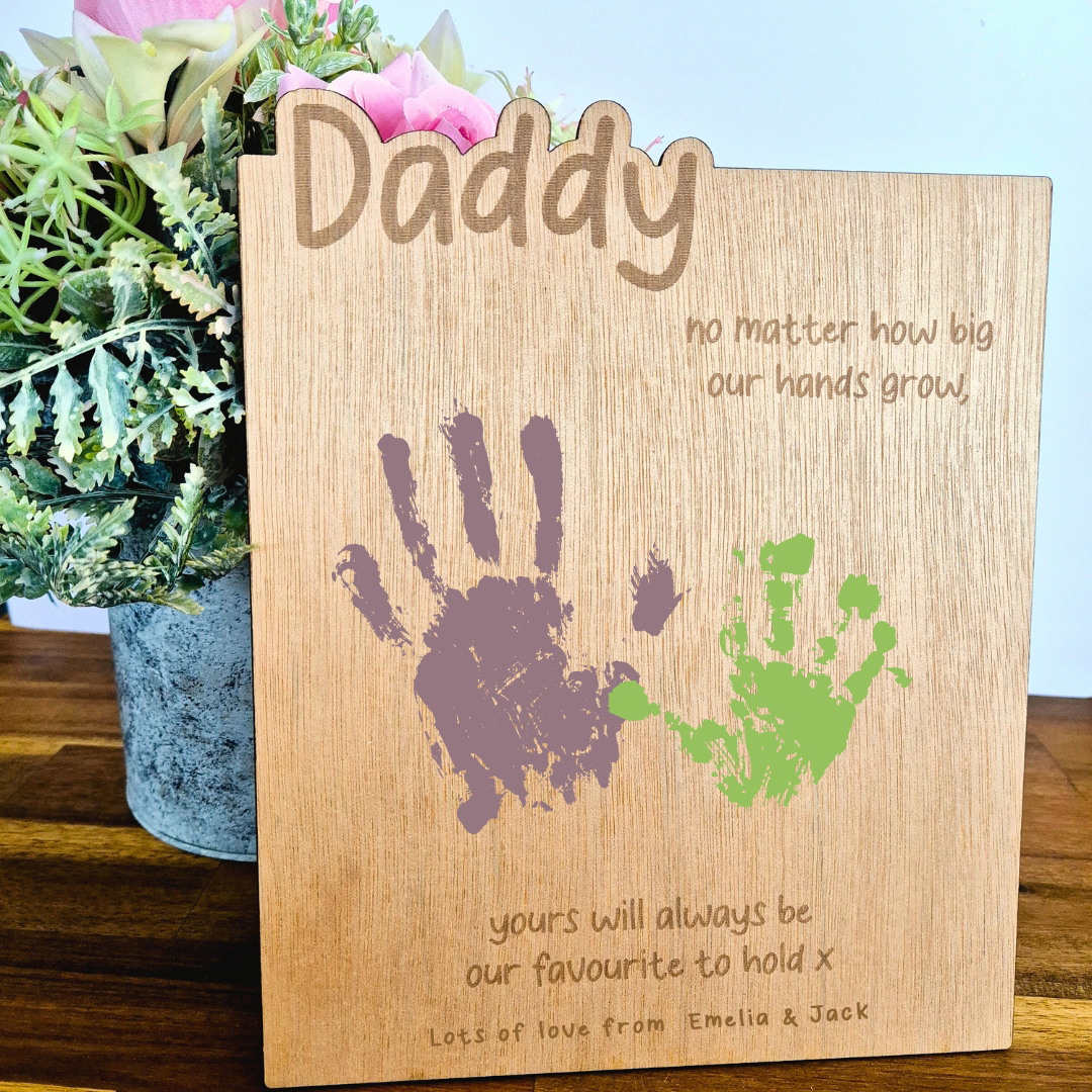 "No matter how big our hands grow" handprint plaque